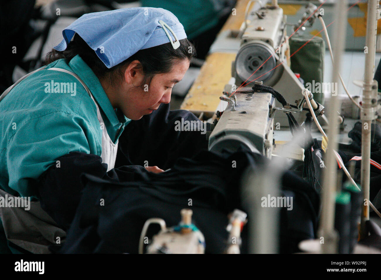 Garment factory worker southeast asia hi-res stock photography and images - Alamy