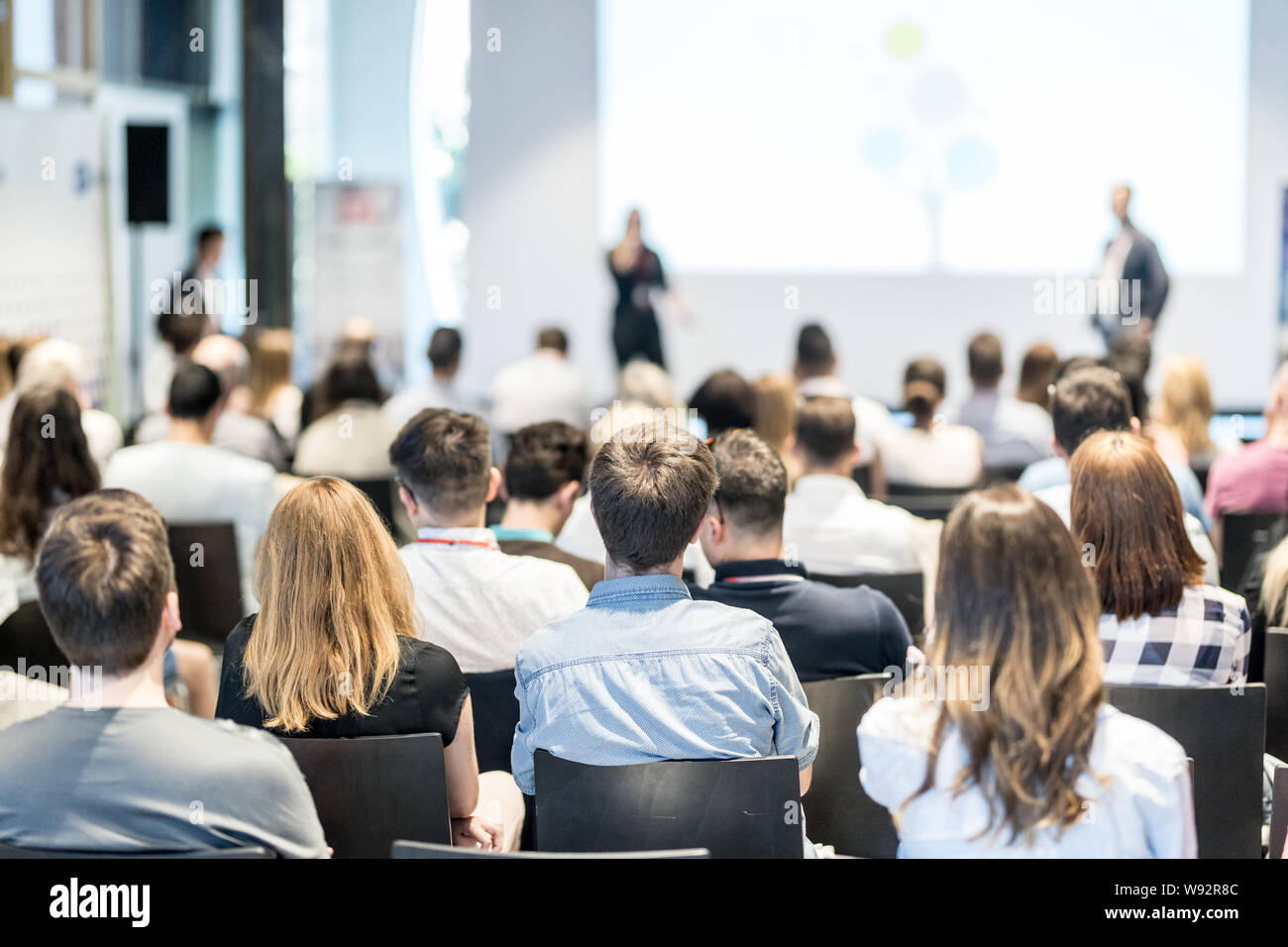 Male business speaker giving a talk at business conference event Stock ...