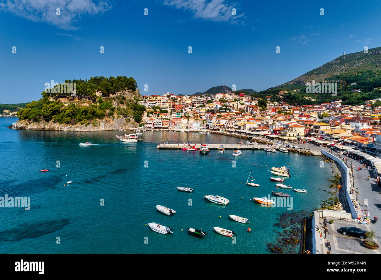 Aerial cityscape view of the coastal city of Parga, Greece during the ...
