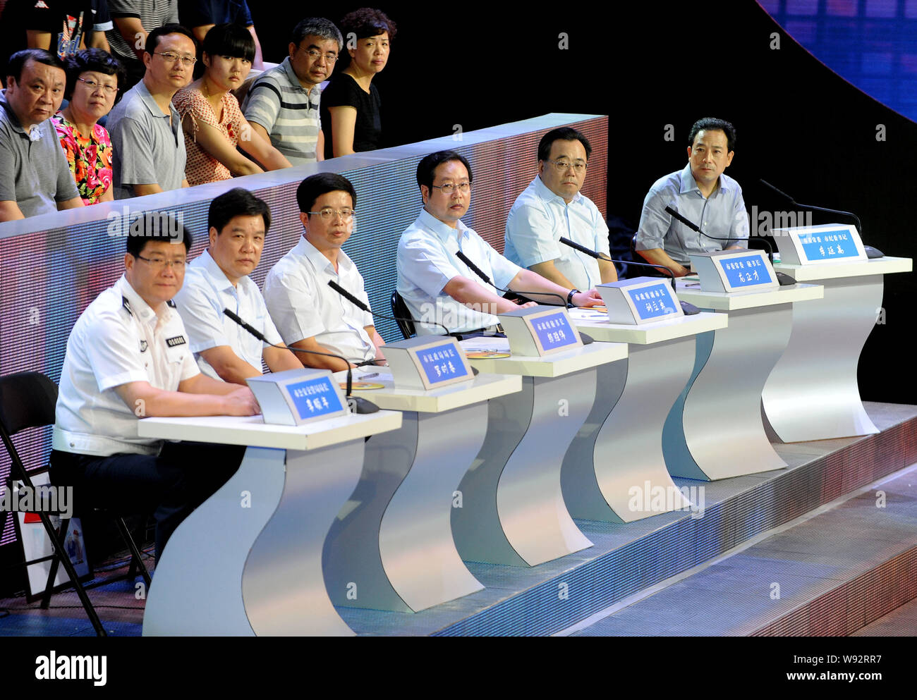 Local Chinese government officials and citizen representatives take ...