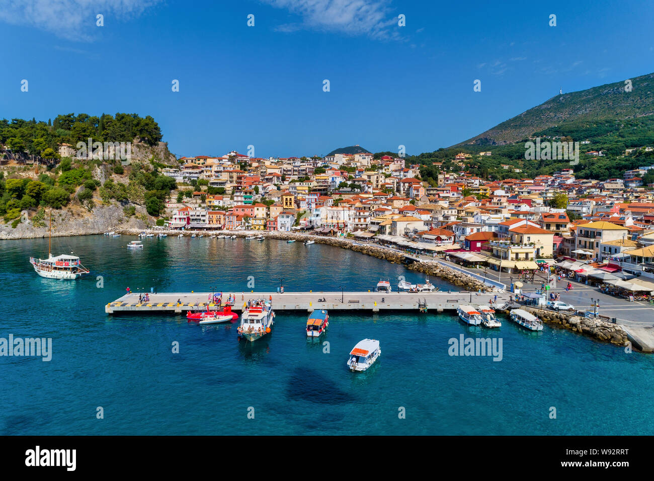 Aerial cityscape view of the coastal city of Parga, Greece during the ...