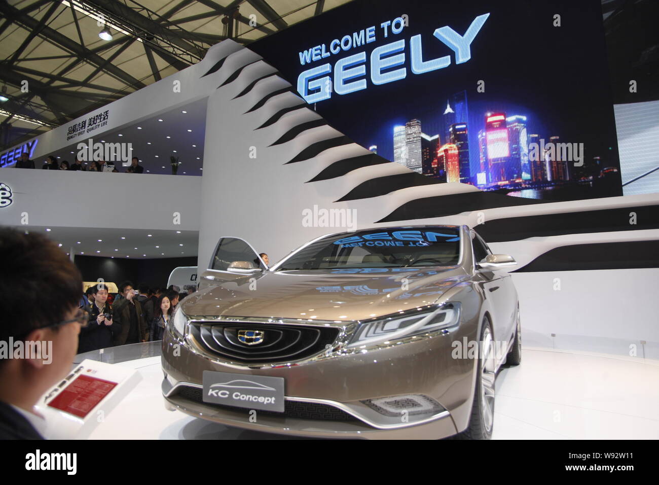 --FILE--Visitors look at an Emgrand KC Concept of Geely during the 15th ...