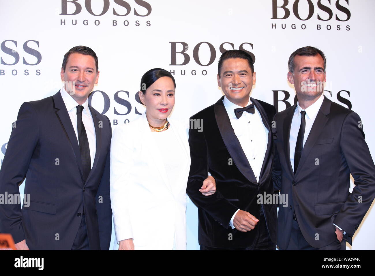 Hong Kong actor Chow Yun-fat, second right, and his wife Jasmine Tan ...