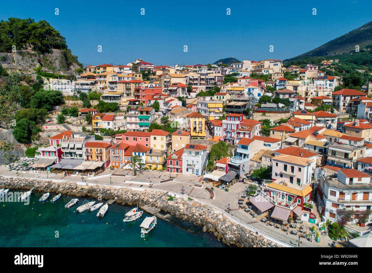 Aerial cityscape view of the coastal city of Parga, Greece during the ...