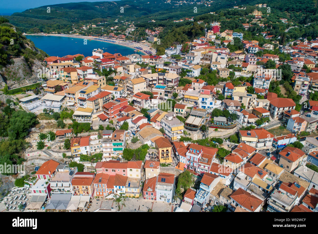 Aerial cityscape view of the coastal city of Parga, Greece during the ...