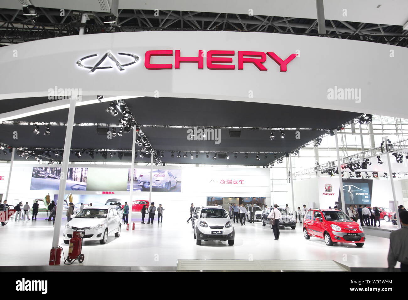 --FILE--People visit the stand of Chery during an automobile exhibition ...