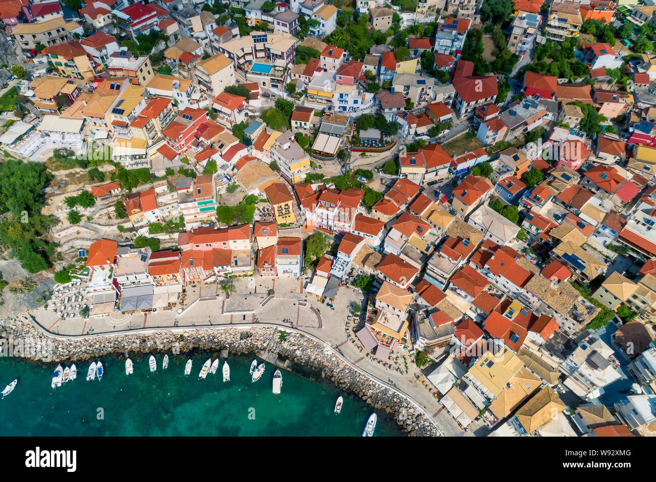 Aerial cityscape view of the coastal city of Parga, Greece during the ...