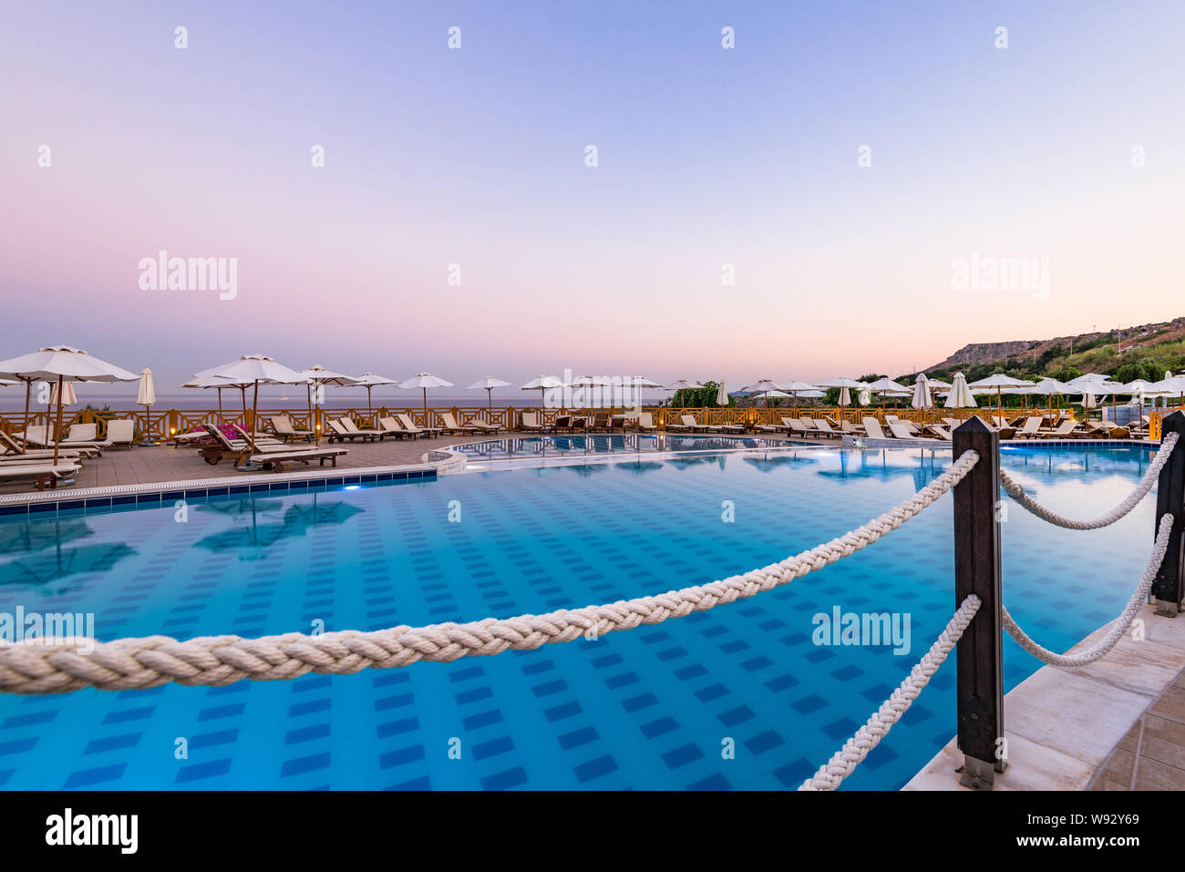 Luxury Swimming Pool at Sunrise in Hotel Resort, Rhodes, Greece Stock ...