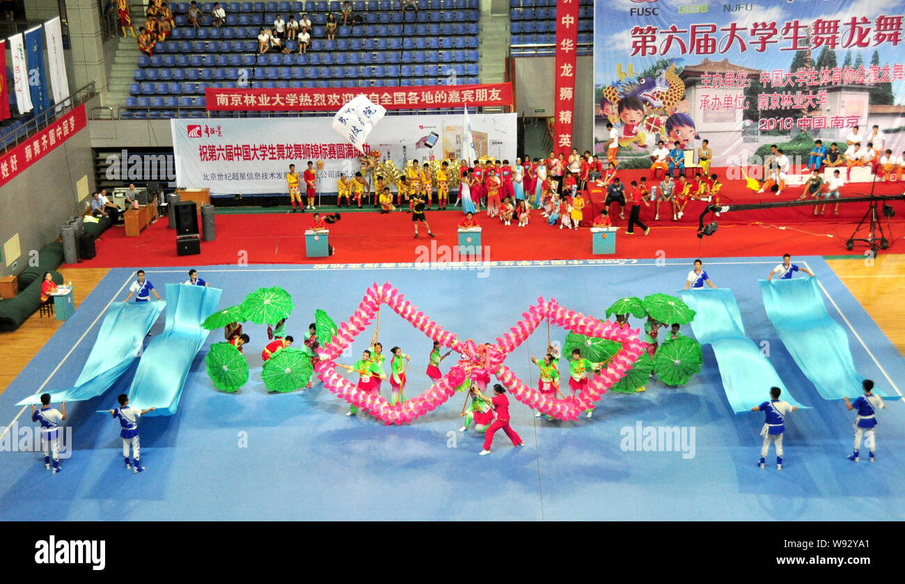 Chinese college students perform dragon dance during the final of 6th ...