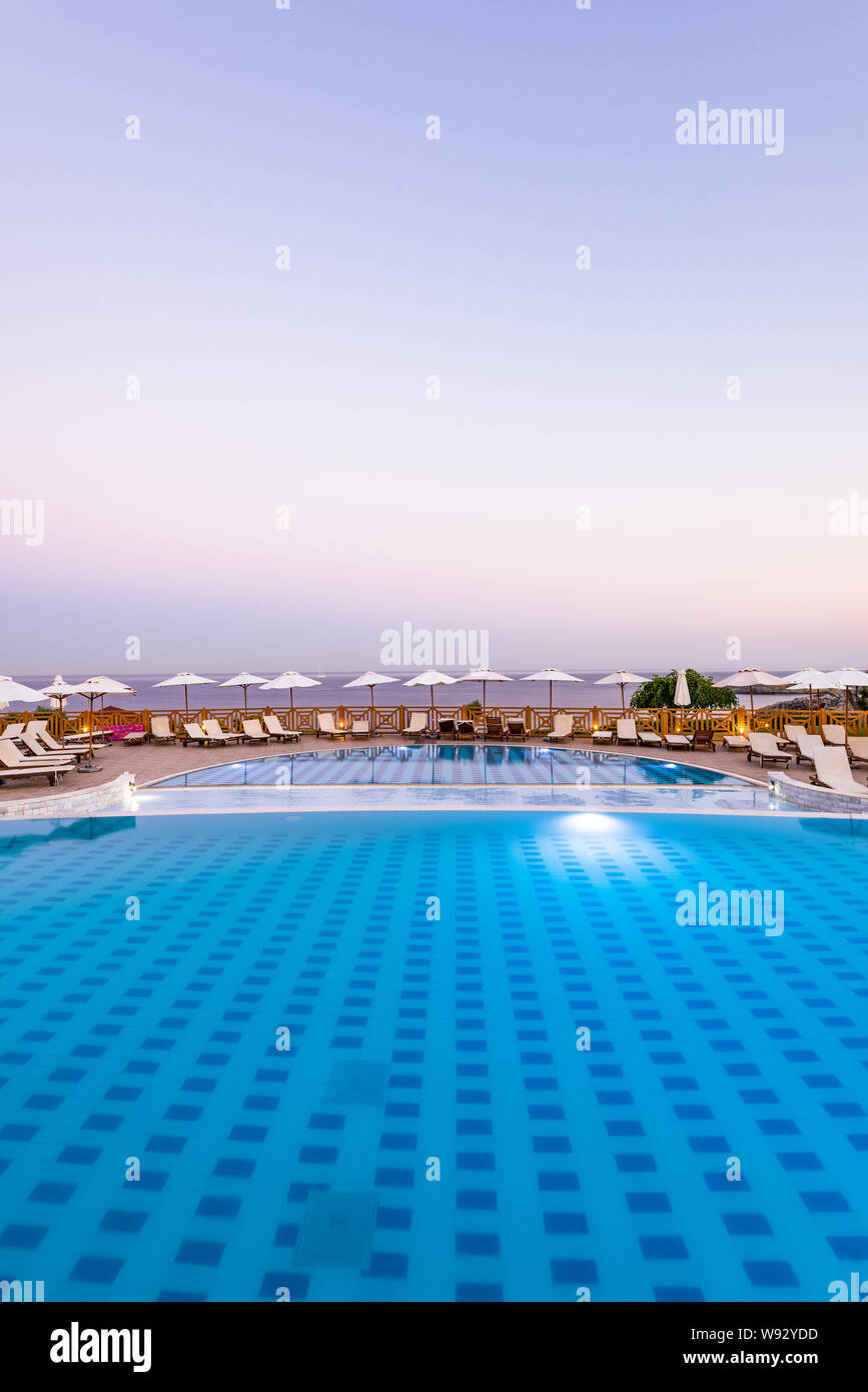 Luxury Swimming Pool at Sunrise in Hotel Resort, Rhodes, Greece Stock ...