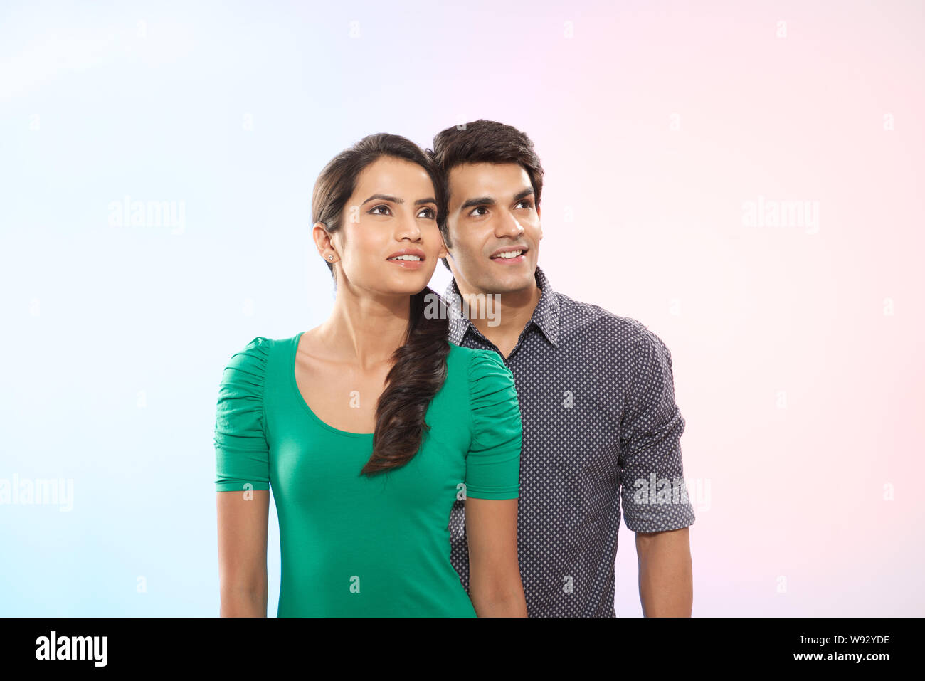 Young couple thinking Stock Photo - Alamy