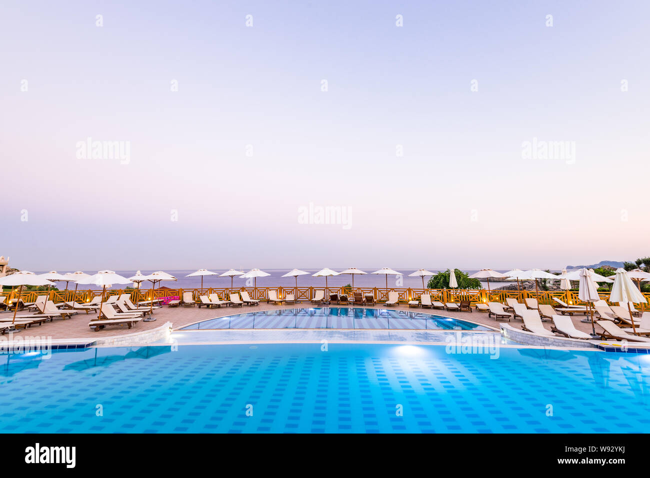 Luxury Swimming Pool at Sunrise in Hotel Resort, Rhodes, Greece Stock ...