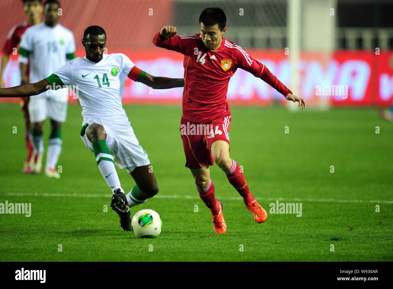 Sun Ke of China, right, challenges Saud Kariri of Saudi Arabia during ...