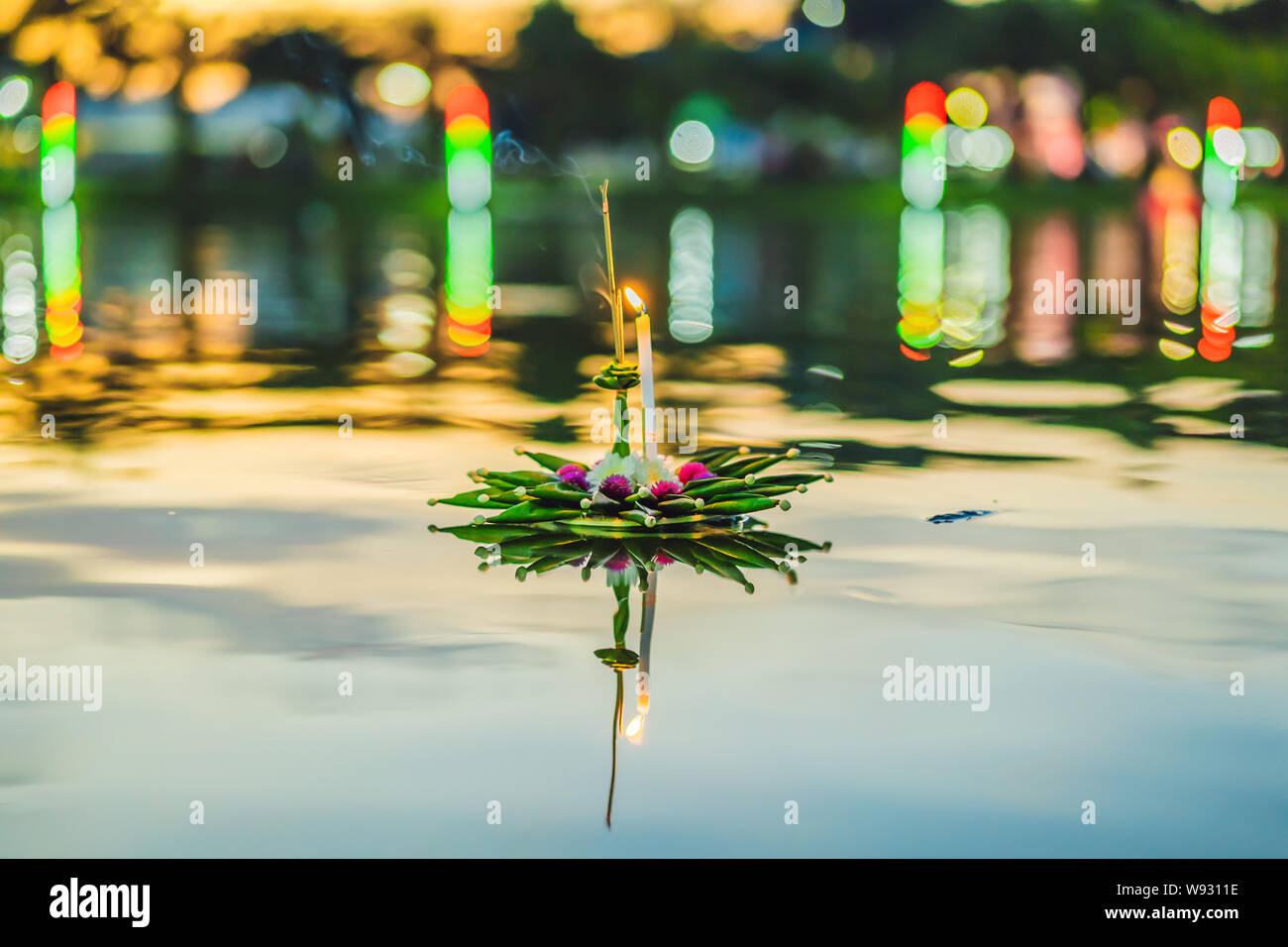Loy Krathong festival, People buy flowers and candle to light and float ...