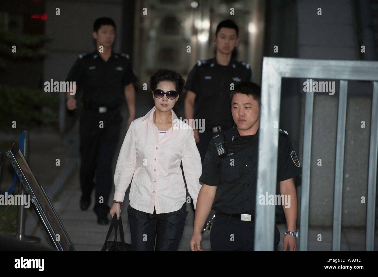 Chinese PLA (Peoples Liberation Army) singer Liu Qingdi, left, better known by her stage name ...