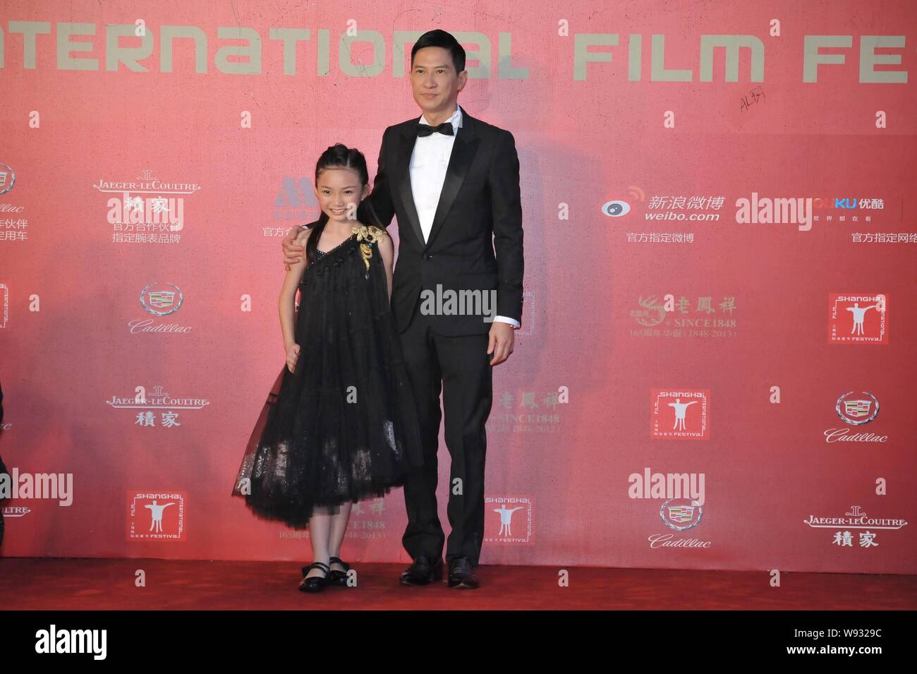 Hong Kong actor Nick Cheung Ka-fai, right, and 10-year-old Malaysian ...