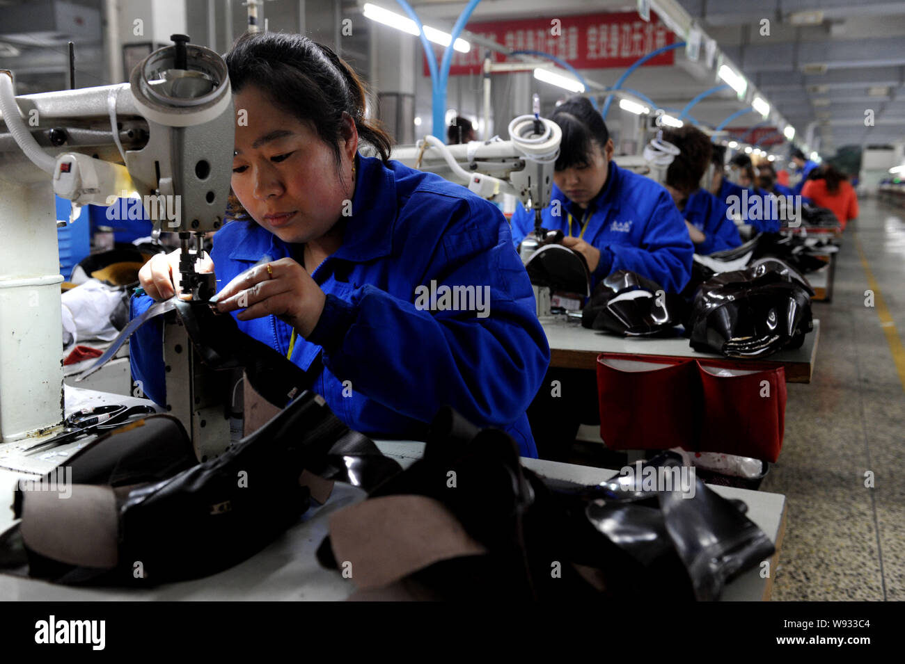 Assembly line workers shoes hi-res stock photography and images - Alamy