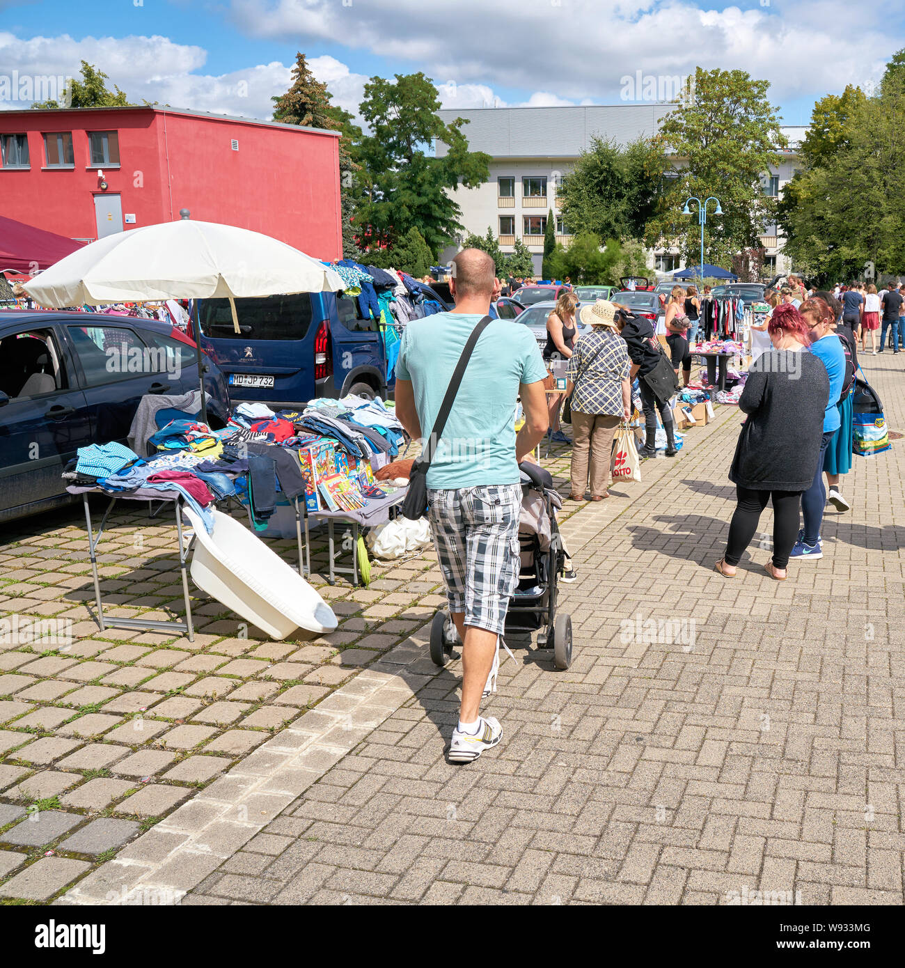 Visitors on a popular flea market in downtown Magdeburg on a Sunday ...