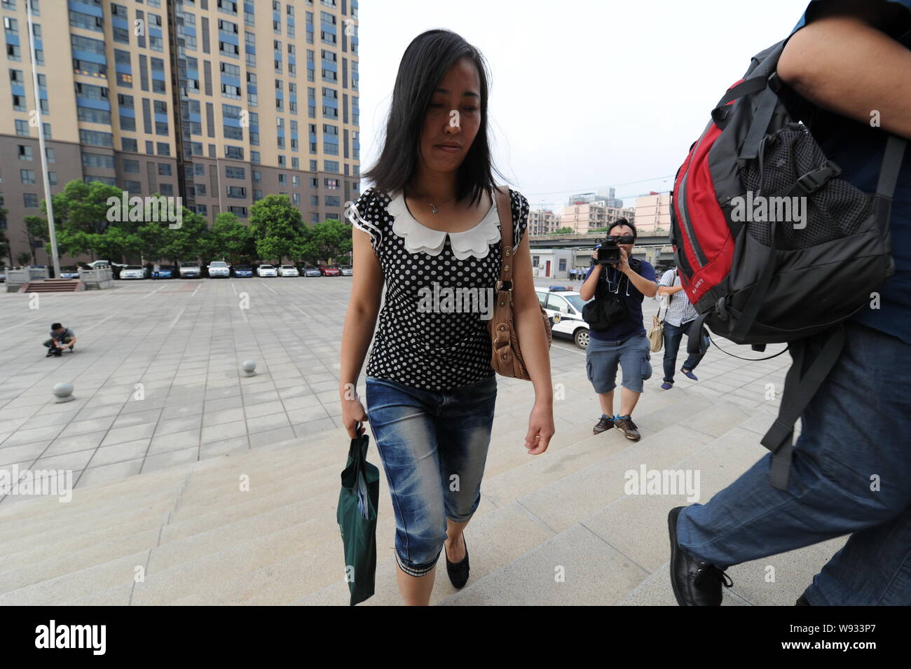 Tang Hui, left, a Chinese mother who was sent to a labour camp after ...