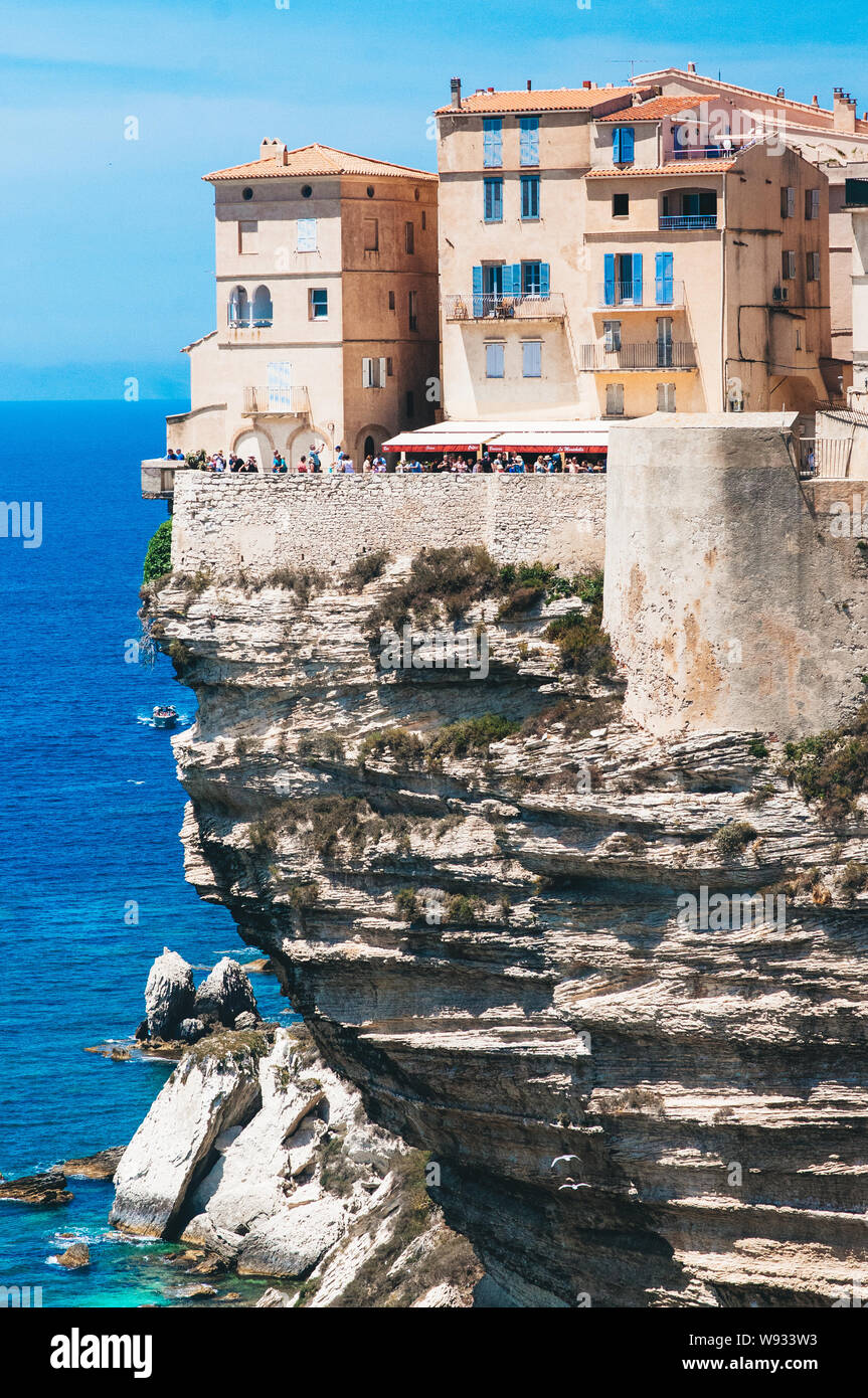 Old houses and city constructed on the edge of high cliffs in Bonifacio ...