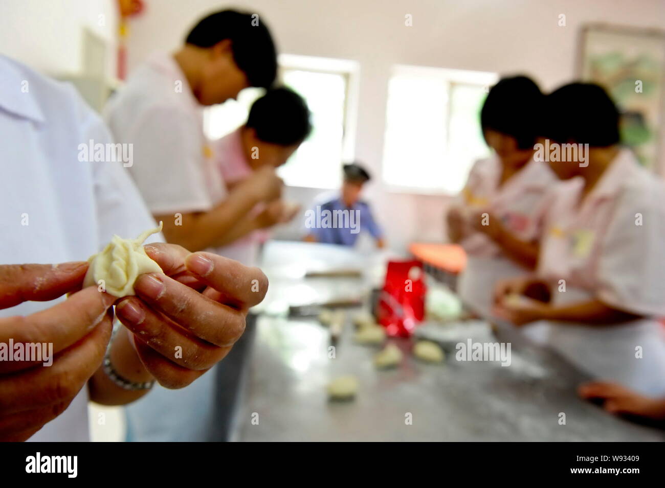 --FILE--Chinese inmates learn to make dim sum at a female labor camp in ...