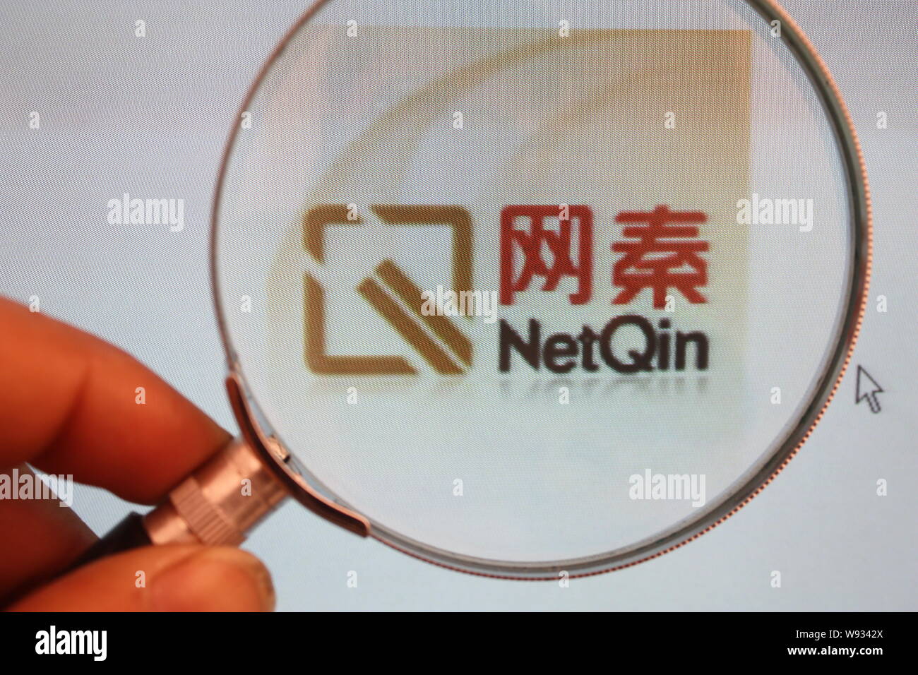 --FILE--A Chinese netizen browses the website of NetQin of NQ Mobile Inc., a Chinese mobile ...