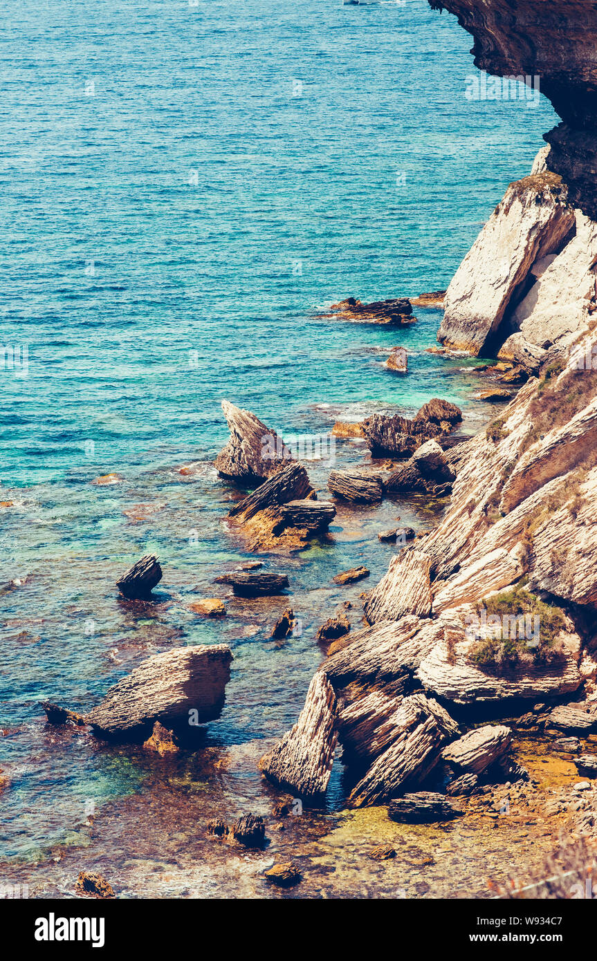 Beautiful blue turquoise sea water with rocks, looking like a lagoon ...