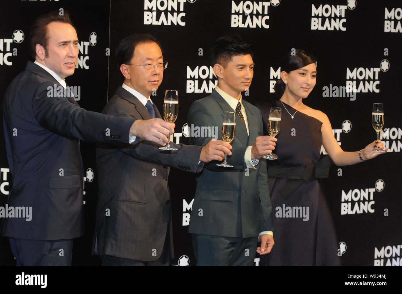 U.S. actor Nicolas Cage, left, Taiwanese actor Nicky Wu, second right ...