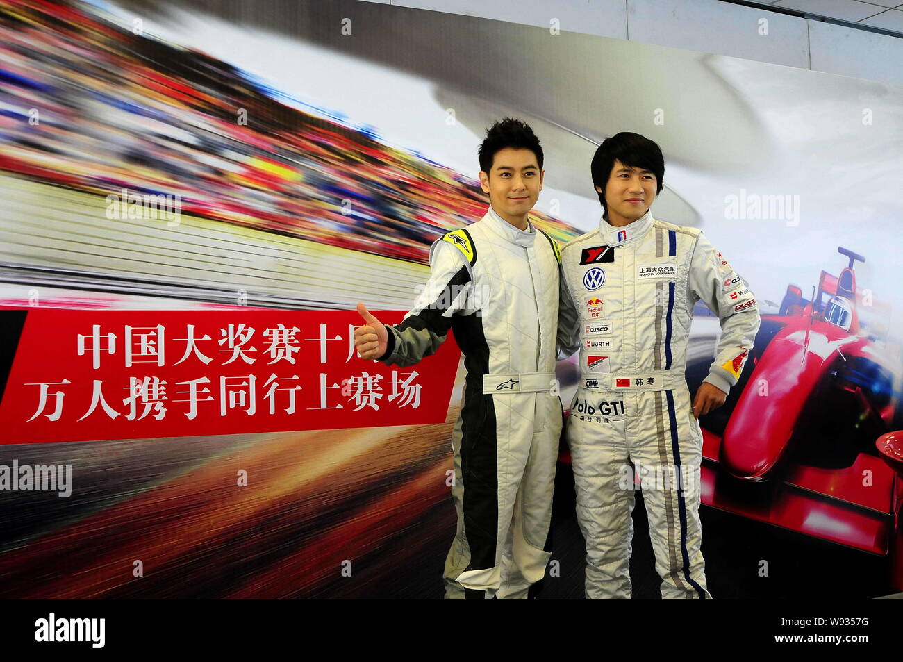 Chinese writer and racer Han Han, right, Taiwanese singer, actor and ...