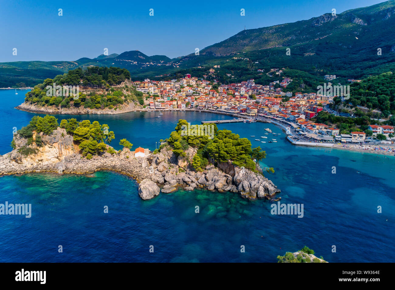 Aerial cityscape view of the coastal city of Parga, Greece during the ...