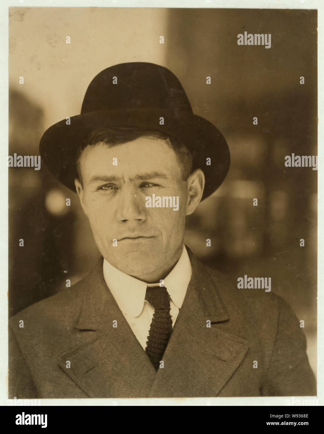 A typical Heavy Man. Old newspaper boy 25 yrs. on streets. (See 1463 ...