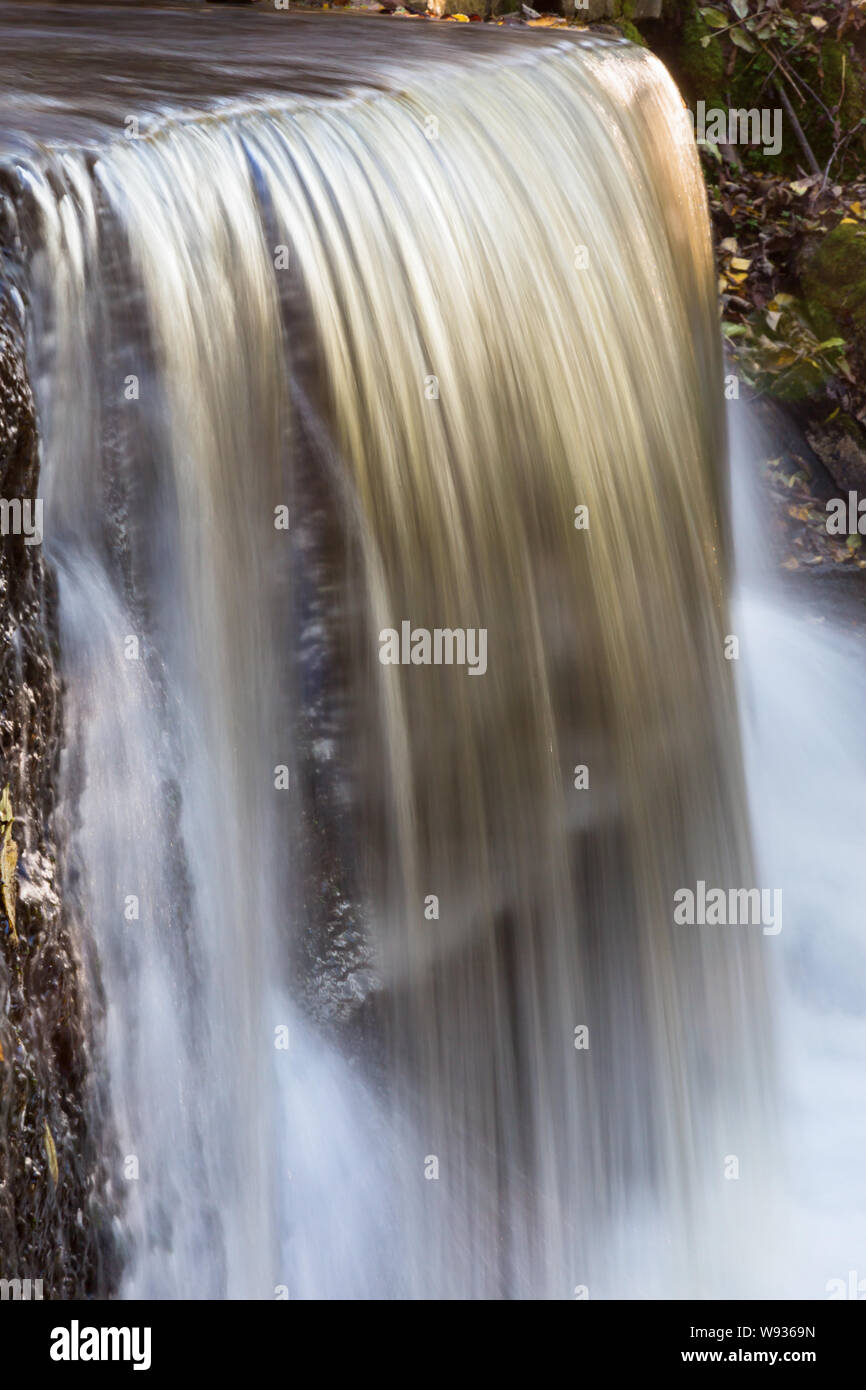 Pond with a waterfall Stock Photo - Alamy