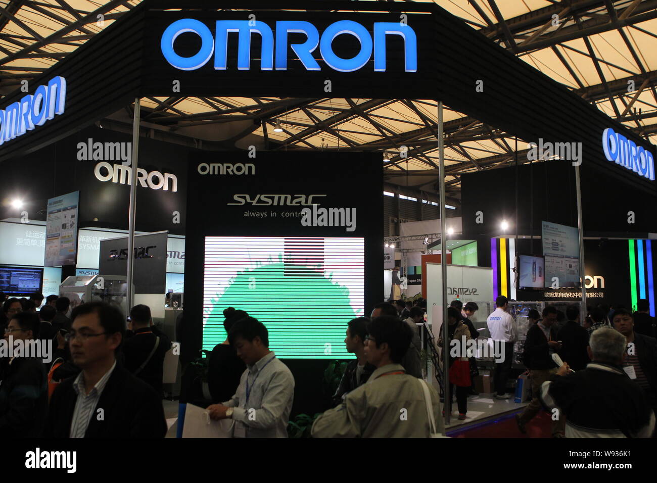 --FILE--Visitors crowd at the stand of Japan-based Omron Control ...