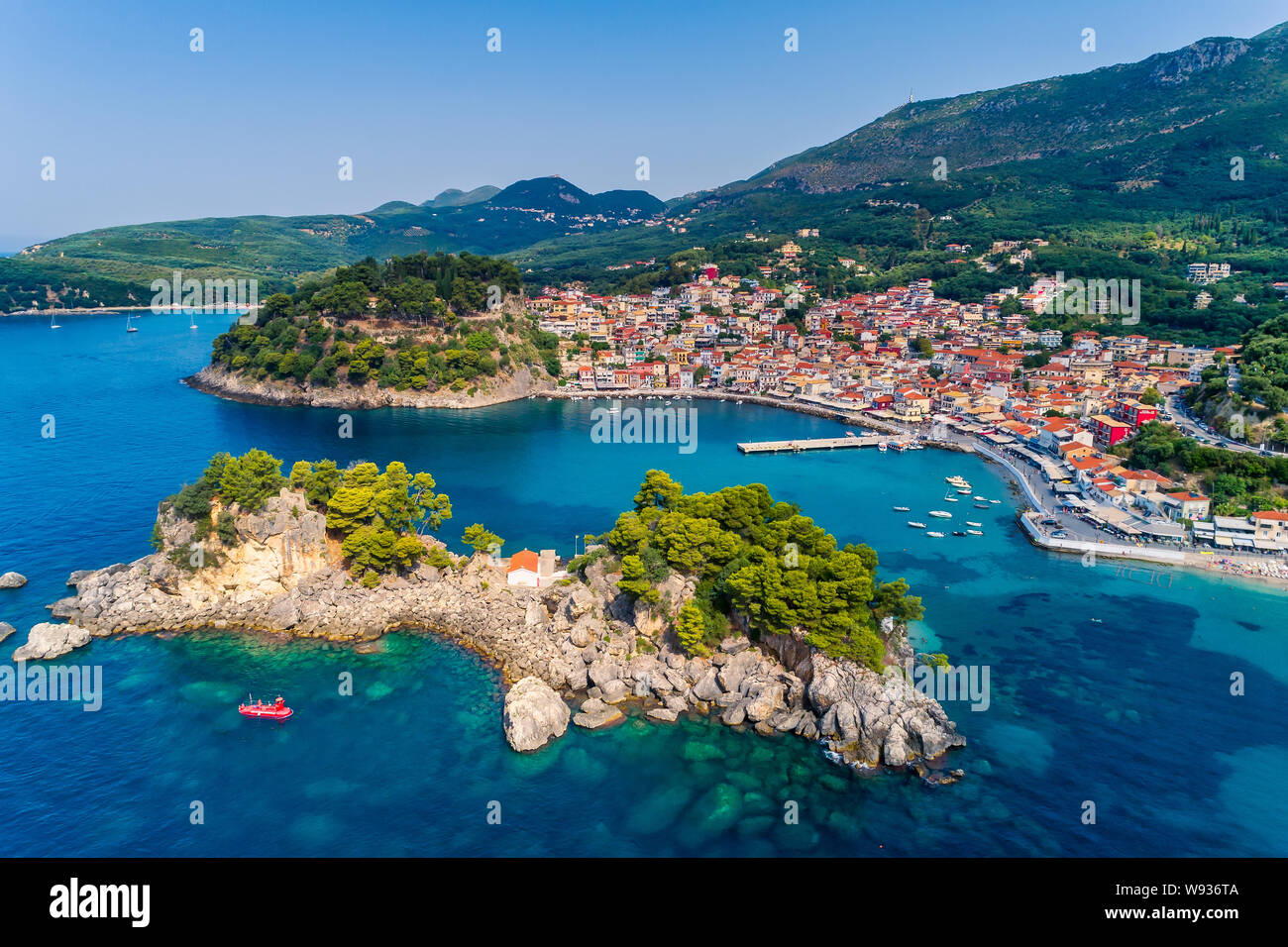Aerial cityscape view of the coastal city of Parga, Greece during the ...