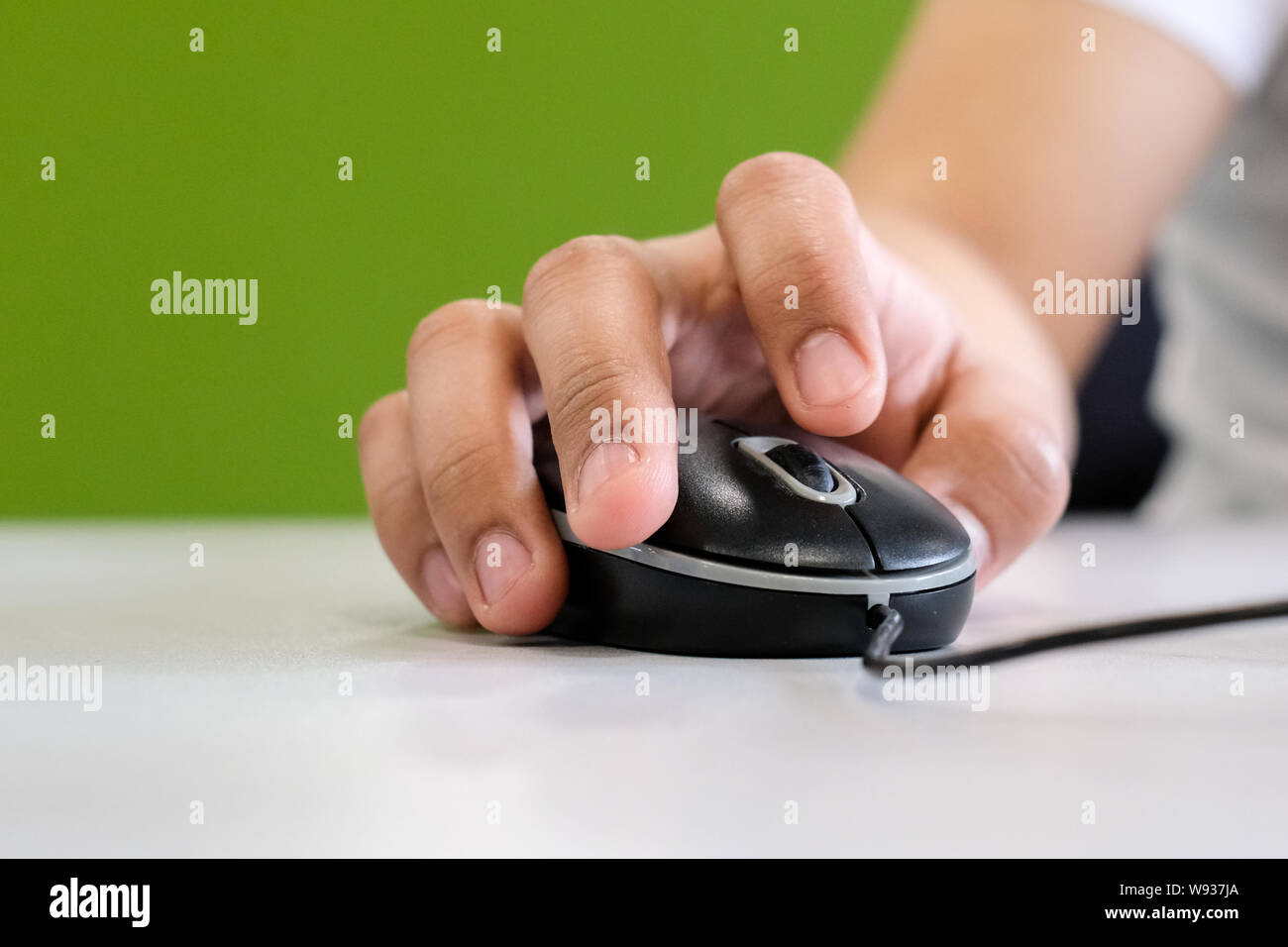 Man holding computer mouse hi-res stock photography and images - Alamy