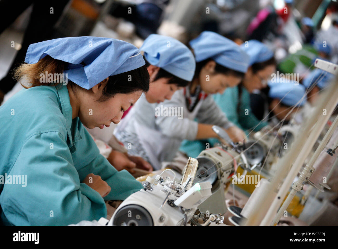 Female manufacturing workers in china hi-res stock photography and ...