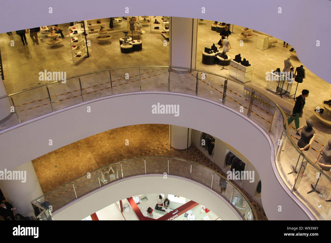 Customers visit the newly-opened Galeries Lafayette flagship shopping ...