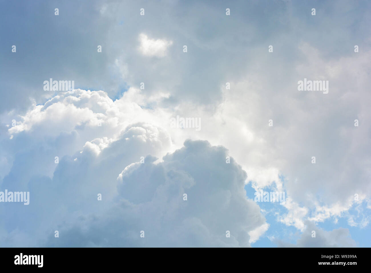 Colorful heavenly angelic white clouds and blue, blue sky with sunlight ...