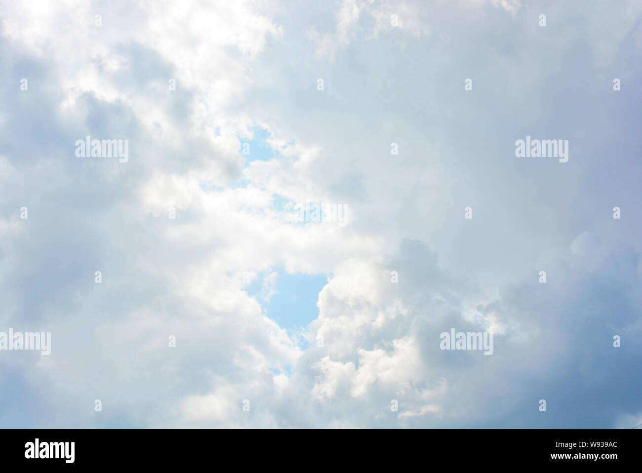 Colorful heavenly angelic white clouds and blue, blue sky with sunlight ...