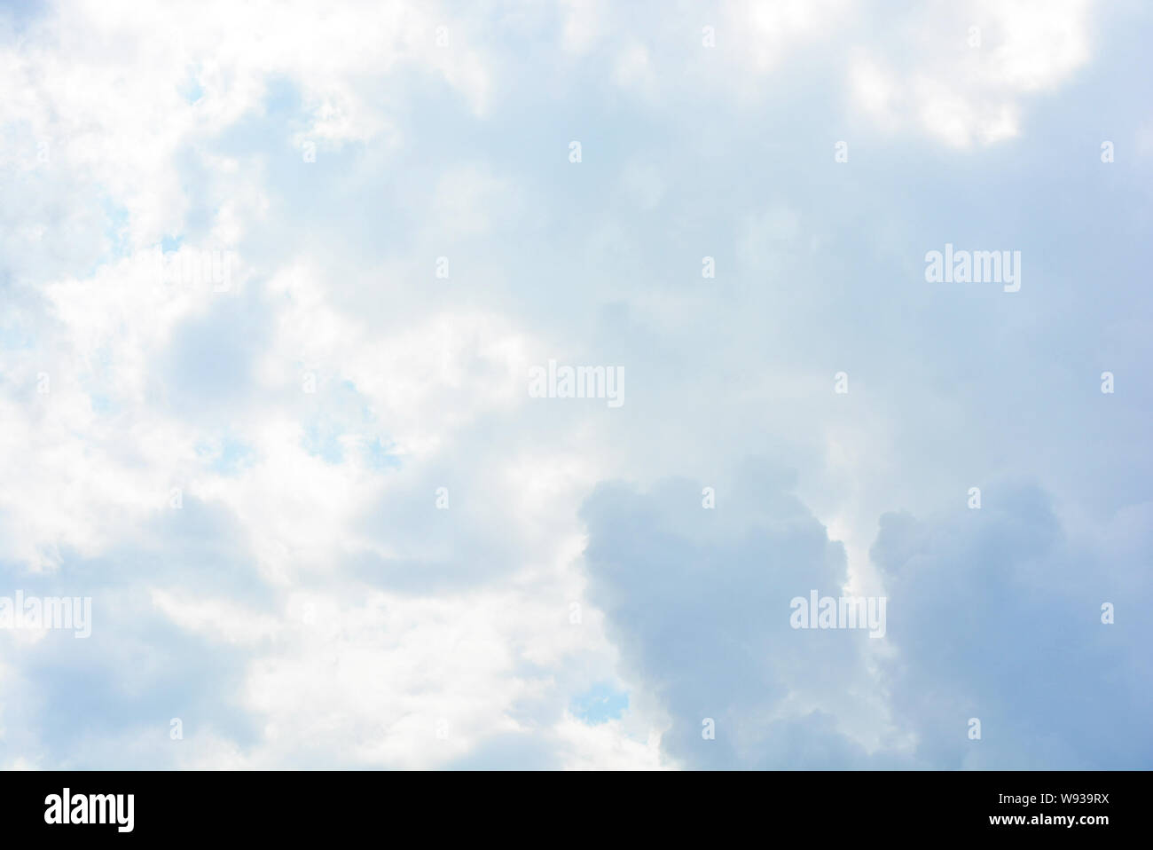 Colorful heavenly angelic white clouds and blue, blue sky with sunlight ...