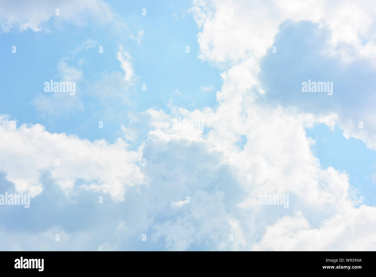 Colorful heavenly angelic white clouds and blue, blue sky with sunlight ...