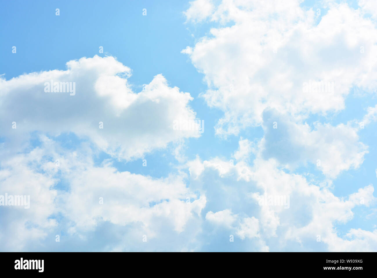 Colorful heavenly angelic white clouds and blue, blue sky with sunlight ...