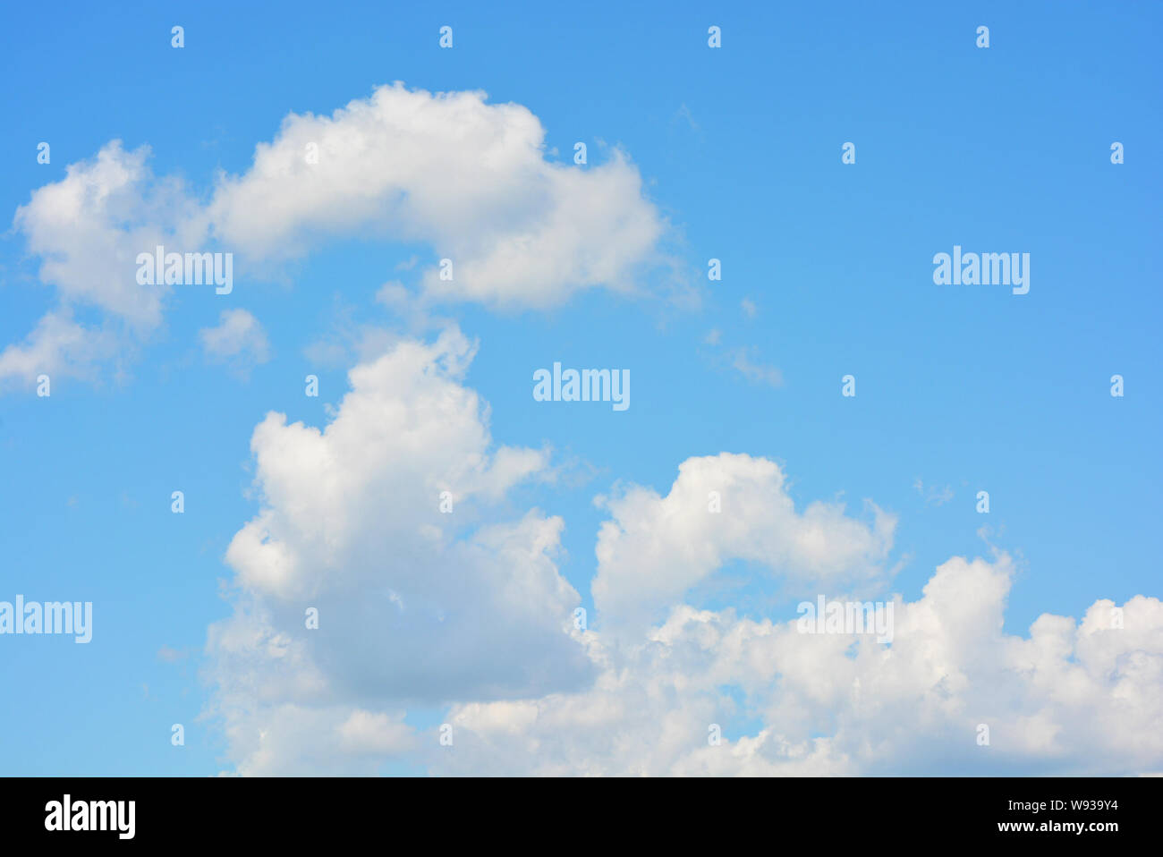 Colorful heavenly angelic white clouds and blue, blue sky with sunlight ...