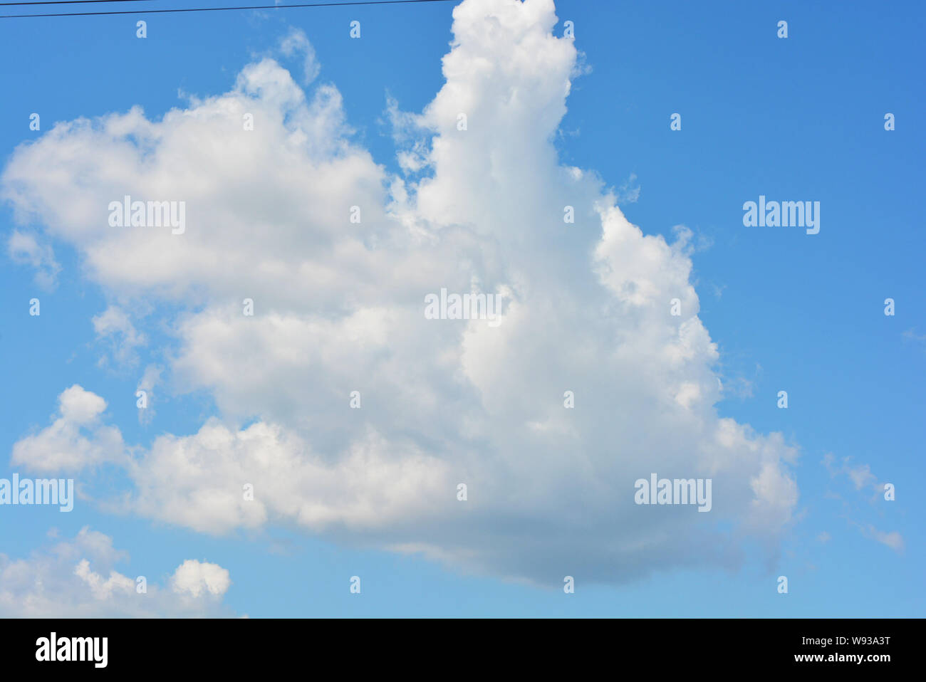 Colorful heavenly angelic white clouds and blue, blue sky with sunlight ...