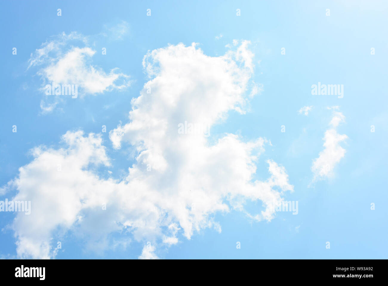 Colorful heavenly angelic white clouds and blue, blue sky with sunlight ...