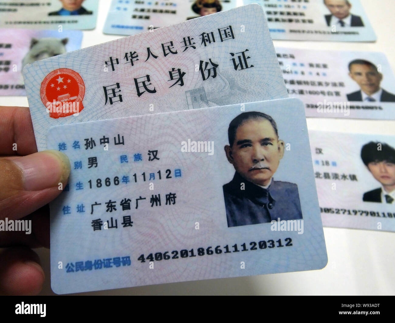 A Man Shows A Fake Chinese ID Card Of Chinese Revolutionary Sun Yat sen A Man Shows A Fake Chinese ID Card Of Chinese Revolutionary Sun Yat sen