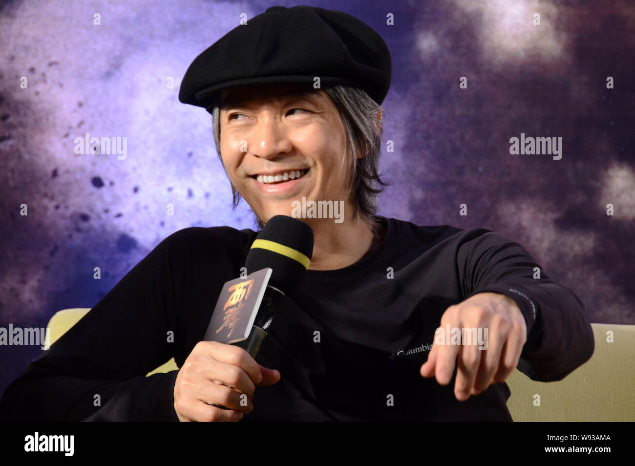 Hong Kong actor and director Stephen Chow smiles during a press ...