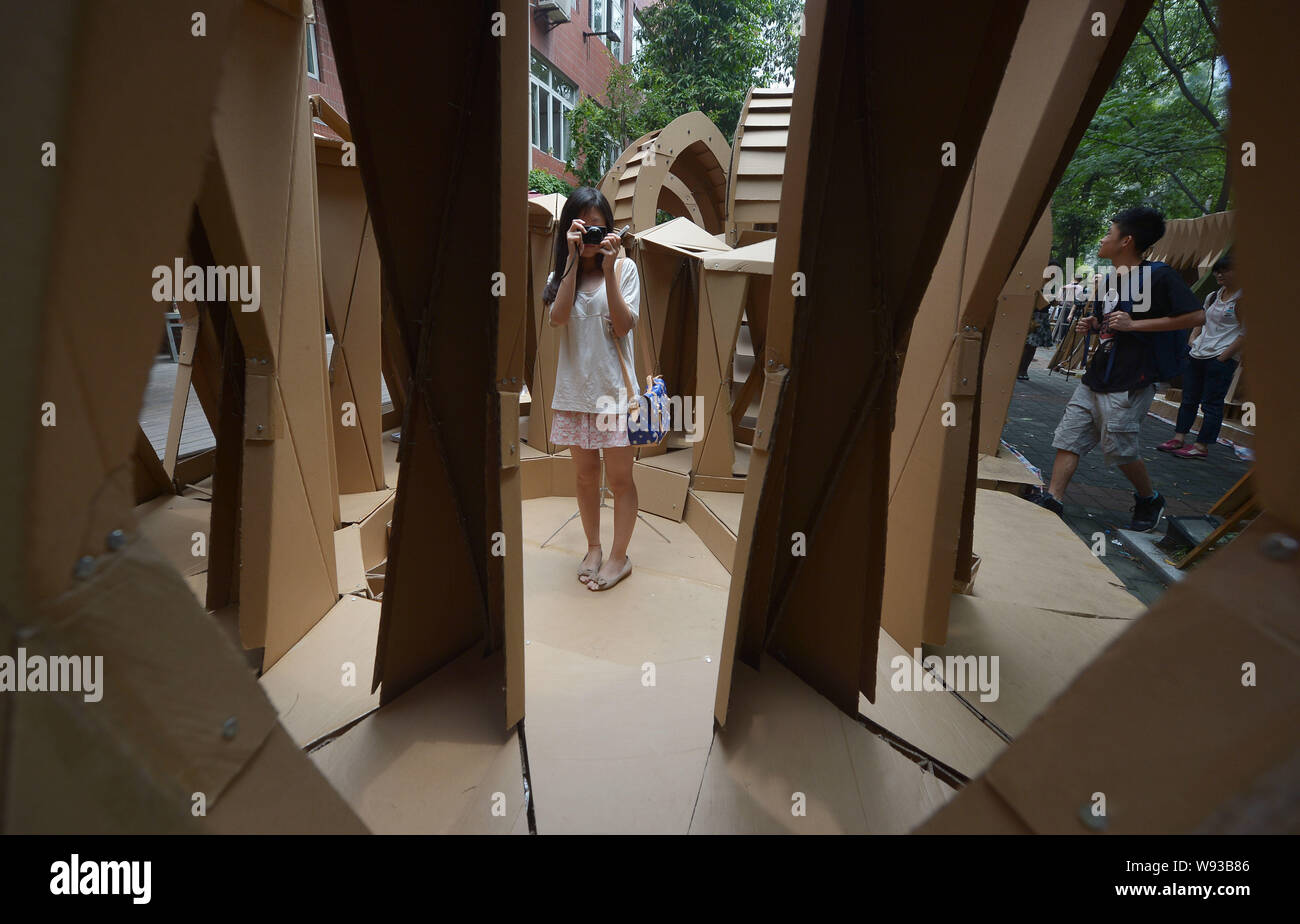 Chinese students view houses made of cardboard at Chongqing University ...