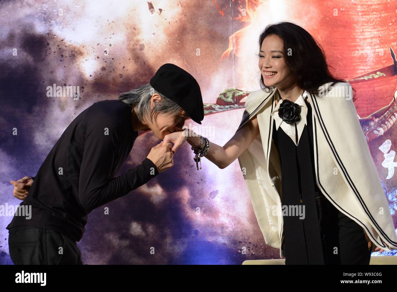 Hong Kong actor and director Stephen Chow,left, gives Taiwanese actress ...