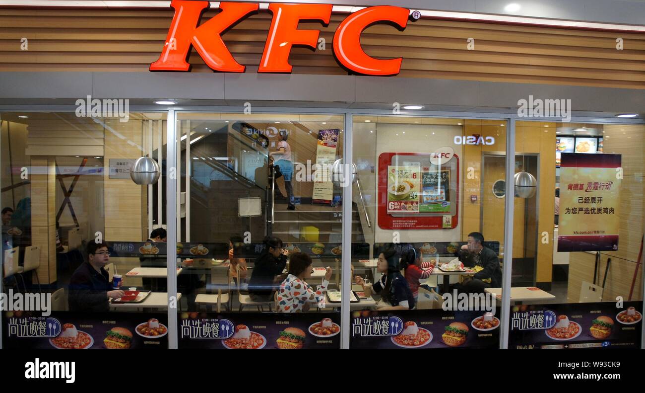 --FILE--Chinese customers eat at a KFC fast-food restaurant of Yum ...